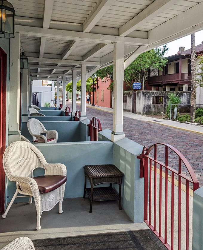 The partitioned porch creates cozy nooks for contemplating life, death, and everything in between with bay views.