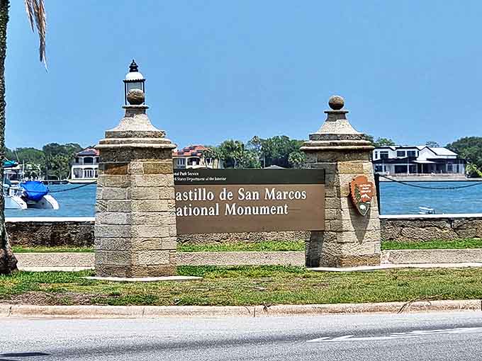The official entrance sign welcomes modern adventurers to this ancient stronghold. Your history lesson begins beyond these pillars.