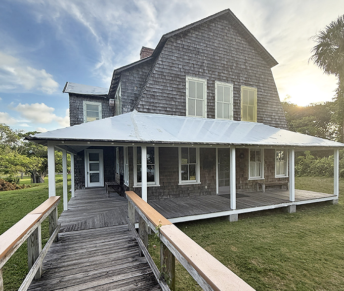 The DuBois Pioneer Home stands as a wooden time capsule, its weathered facade telling stories of Florida life before air conditioning changed everything.