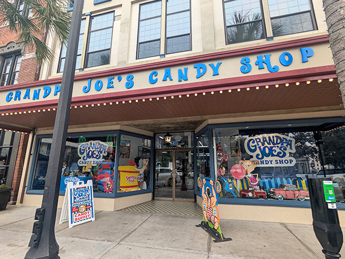 The gateway to glucose paradise, where the bright blue storefront promises adventures sweeter than your wildest dreams.