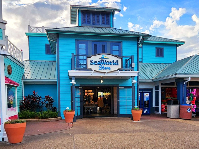 SeaWorld Store: The vibrant blue façade welcomes shoppers seeking marine-themed souvenirs, with a portion of proceeds supporting the park's wildlife rescue and rehabilitation programs.