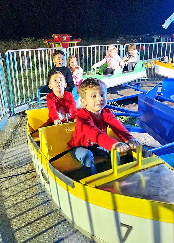 Children's faces light up brighter than the carnival rides themselves, capturing that fleeting magic of childhood wonder we all chase.