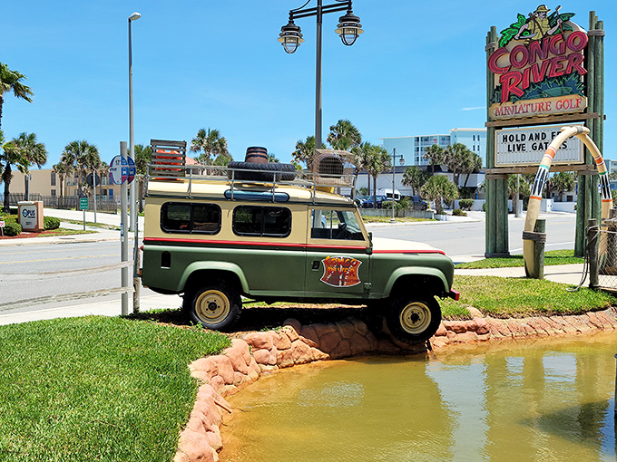 Seemingly frozen mid-expedition, this classic Land Rover creates Congo River's most iconic visual, perpetually navigating the treacherous waters of adventure.