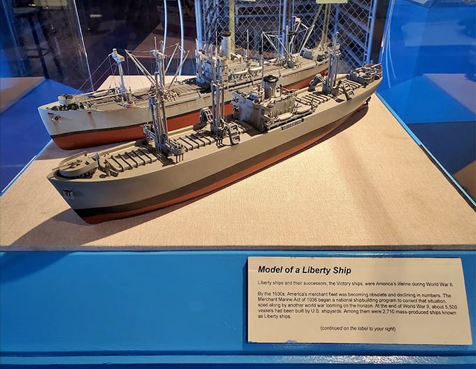 These meticulously crafted Liberty Ship scale models demonstrate the evolution of merchant vessel design during wartime production.