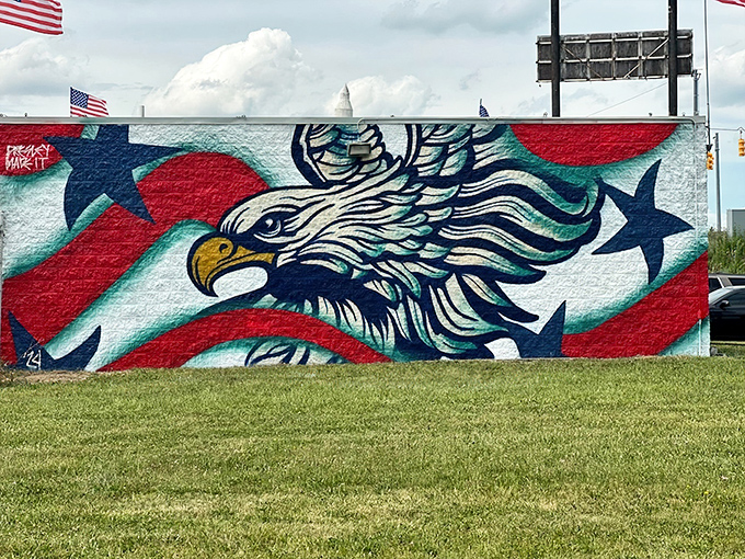 The eagle artwork complements Uncle Sam perfectly, adding another layer of patriotic imagery to this roadside attraction complex.