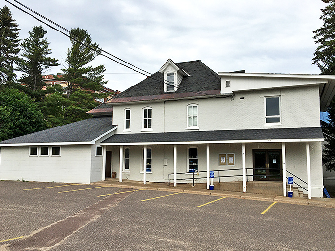 North Wind Books' charming white exterior houses literary treasures focusing on local history and Finnish-American culture.