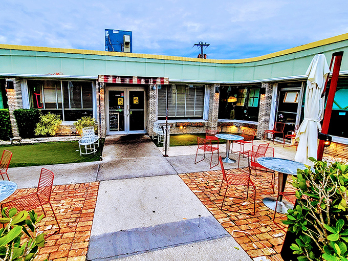 Florida sunshine transforms brick pavers and colorful chairs into the perfect setting for people-watching between bites.