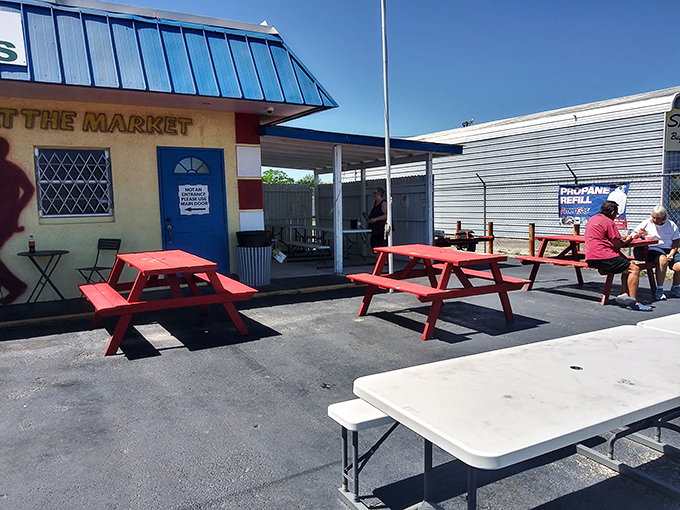 Red picnic tables invite you to enjoy Florida sunshine with your treats—because ice cream always tastes better with vitamin D.