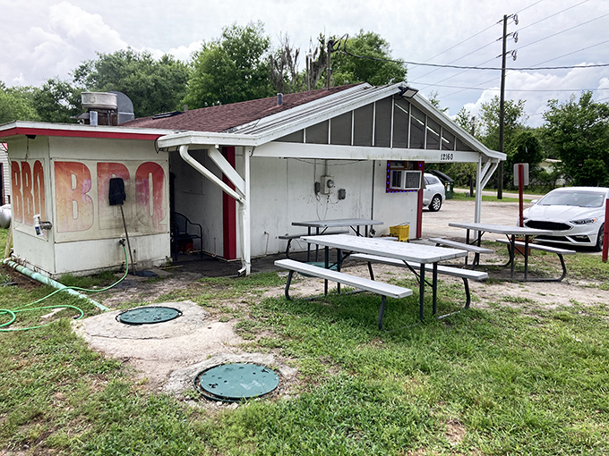 Those picnic tables aren't just seating&mdash;they're front-row tickets to the best smoke show in Florida. BBQ perfection needs no fancy packaging.