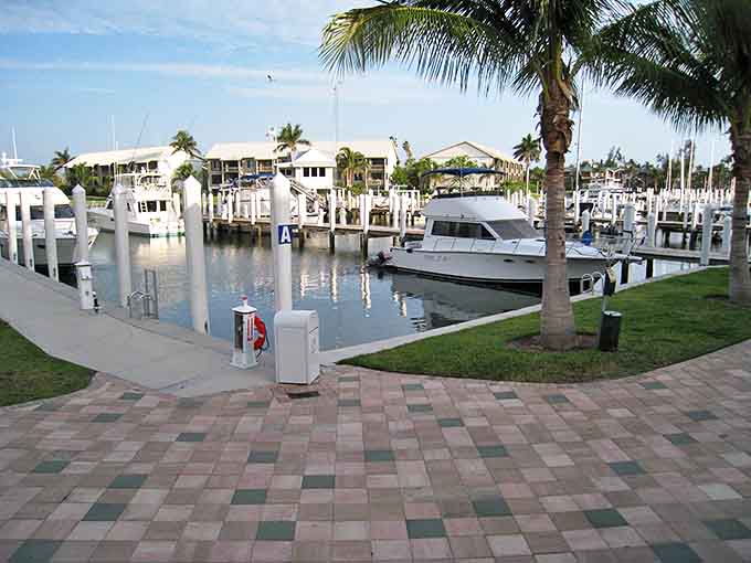 Boats bob peacefully in South Seas Marina, their owners temporarily trading land legs for sea legs in pursuit of Gulf Coast adventures.
