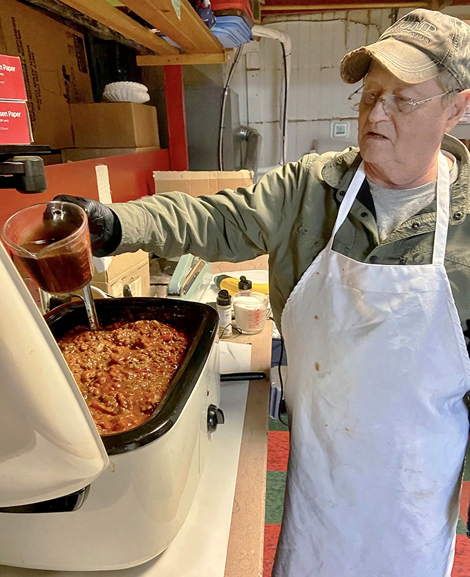 Staff: The keeper of the chili tradition stirs tomorrow's comfort food &ndash; decades of experience in every careful movement.