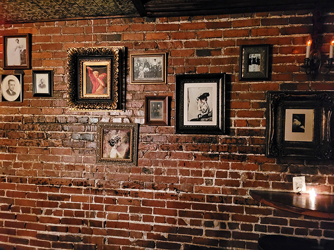 Wall decor: Framed memories from another era adorn weathered brick &ndash; silent witnesses to countless whispered secrets and raised glasses.