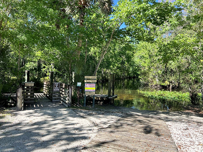 Warning signs and welcome signs coexist at this park entrance &ndash; nature's way of saying "Come in, but remember who's house this is."