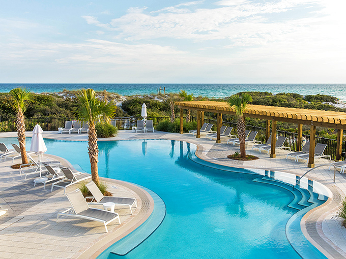 WaterColor Inn's poolside paradise offers the ultimate decision paralysis: ocean or pool? The correct answer is "both."