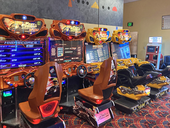 Racing games in the arcade provide pre-movie entertainment, letting you burn off excitement before sitting still for two hours.
