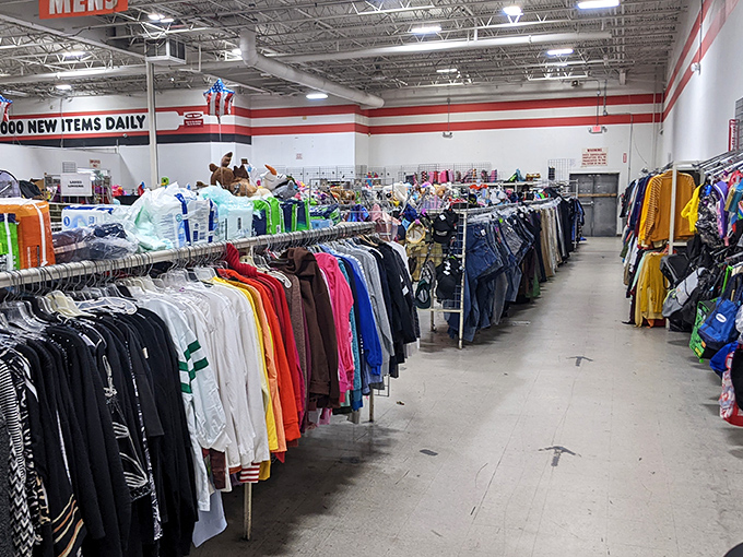 Racks stretch toward infinity, creating canyons of clothing where patient shoppers can discover everything from basic tees to designer treasures.