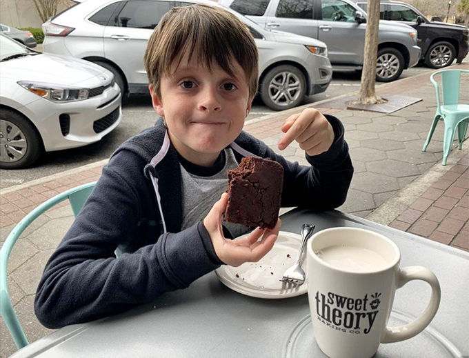 A young customer experiences what might be his first "food epiphany" moment &ndash; that look when you realize some things are worth savoring.
