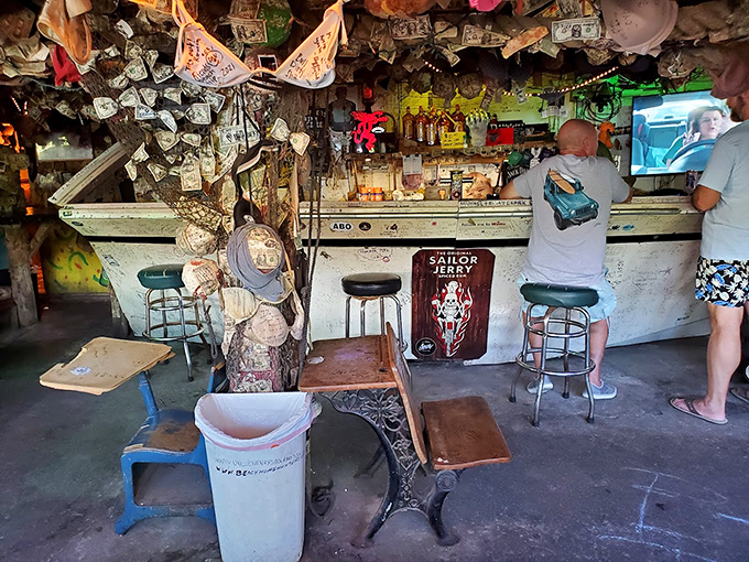 Money literally lines the walls and ceilings &ndash; patrons leaving their mark in a tradition that's turned the interior into a dollar-bill art installation.