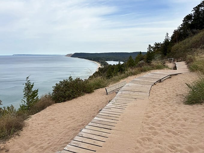 The final stretch of boardwalk feels like walking on nature's red carpet, with Lake Michigan applauding your journey in gentle waves.