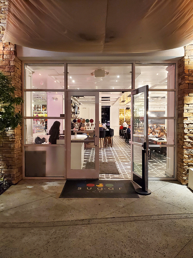 The entrance promises a world where calories don't count and moderation is something that happens to other people, elsewhere.