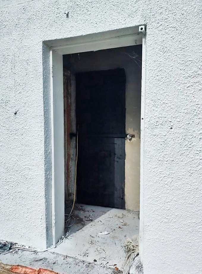 This unassuming doorway served as the threshold between freedom and incarceration for decades of Gilchrist County residents who ran afoul of the law.