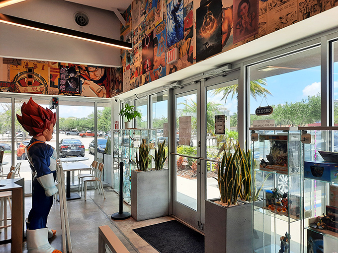 Sunlight streams through the entryway, illuminating anime art and plants in perfect harmony &ndash; like nature and fantasy finding common ground.