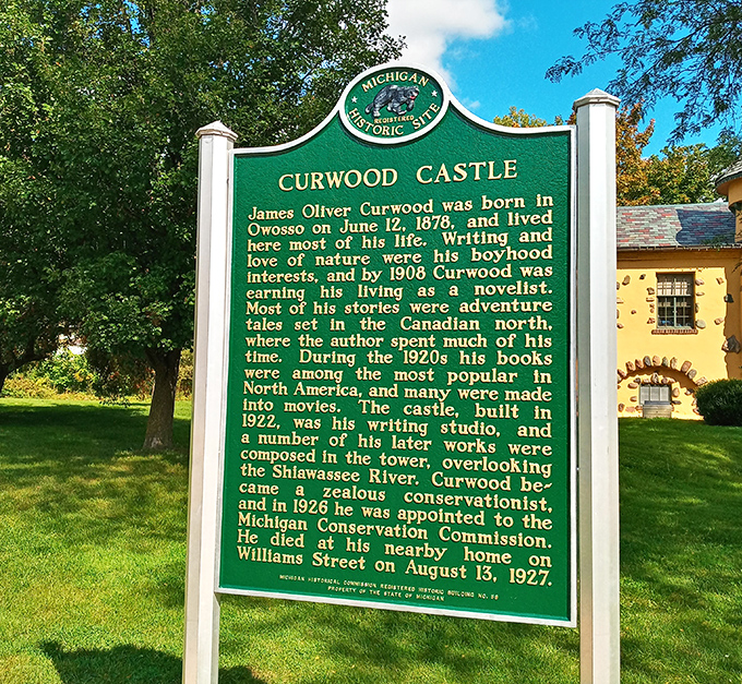 This historical marker tells Curwood's story in brief, but the real tale unfolds inside the yellow castle that stands as his legacy.