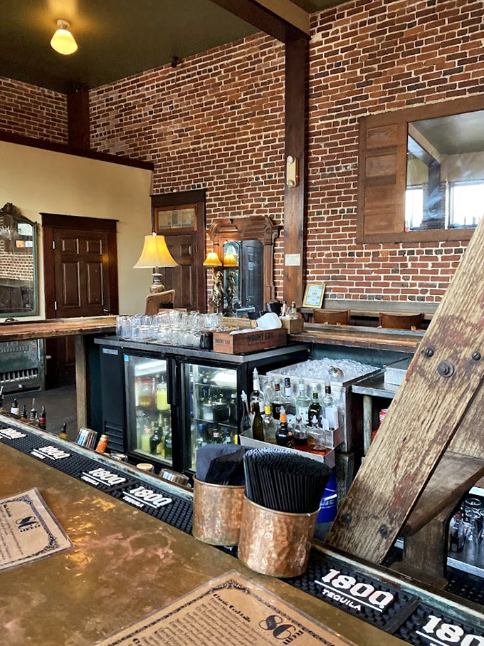 Vintage chandeliers cast a warm glow over proceedings, turning ordinary evenings into something from a more glamorous era.