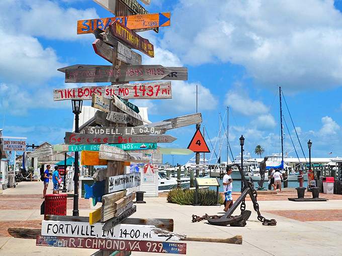 The marina's directional sign post points to faraway places, but the best destination might be the seafood restaurant just steps away.