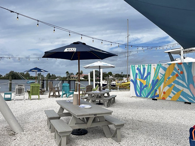 Outdoor seating with water views and string lights creates the kind of Florida dining experience that makes northerners question their life choices during winter.