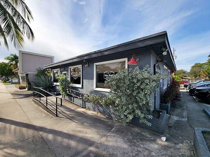 Morning sunshine bathes the simple exterior, while palm trees remind you you're in Florida's breakfast paradise.