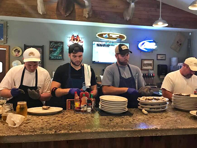 The unsung heroes of flavor town, working with the synchronized precision of people who know they're delivering more than just food.