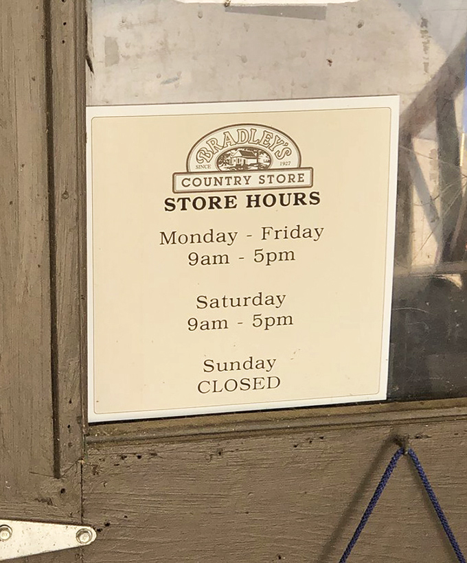 Store hours posted in the window remind visitors this is a place that still observes Sunday rest &ndash; some traditions are worth preserving.