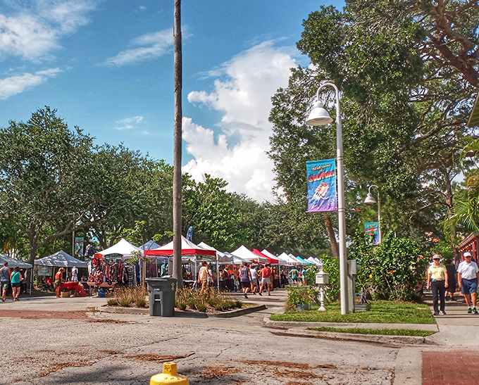 Gulfport's famous street market transforms ordinary afternoons into festive gatherings, where local artisans and food vendors create a carnival atmosphere under Florida's endless sky.
