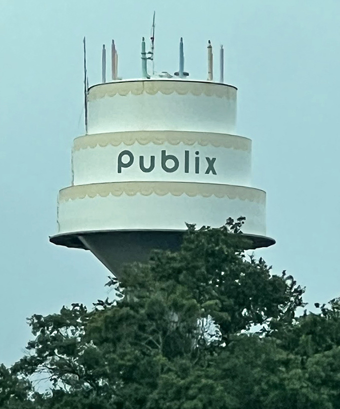 The tower's top tier features pastel-colored candles that seem perpetually ready to grant the birthday wishes of an entire city.