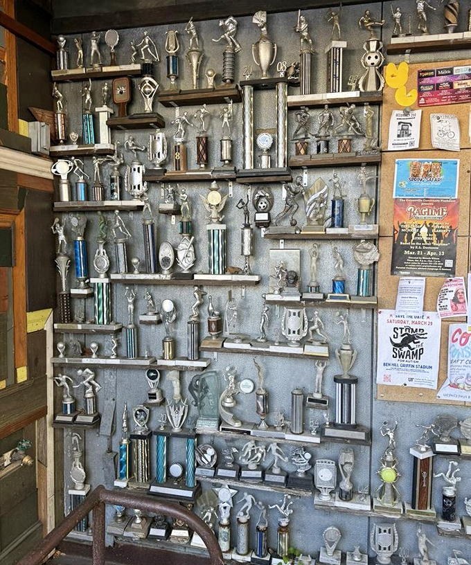 A monument to unknown victories! Decades of little league triumphs and bowling championships create a shrine to everyday excellence.