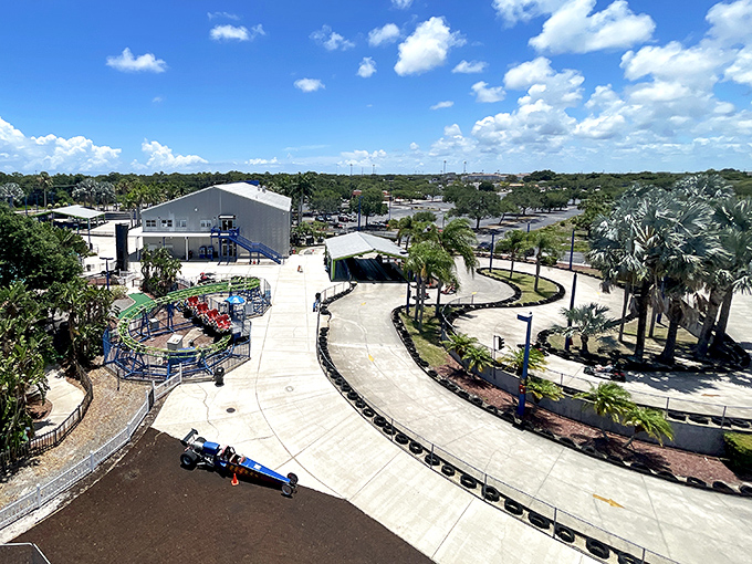 An aerial view reveals the park's thoughtful design, where racing tracks, water features, and attractions create a playground for all ages.