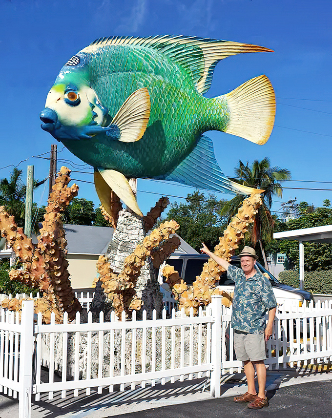 The white picket fence adds a charmingly domestic touch, as if someone decided to keep a pet fish and things got wonderfully out of hand.