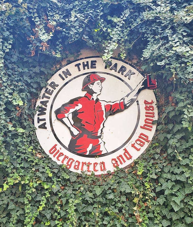 Atwater's distinctive logo featuring a figure in red watches over proceedings like a secular saint of suds, nestled among ivy on the exterior.