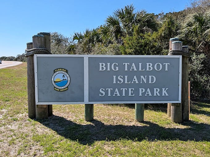 The welcoming sign marks the entrance to one of Florida's most precious coastal treasures, promising natural wonders beyond.