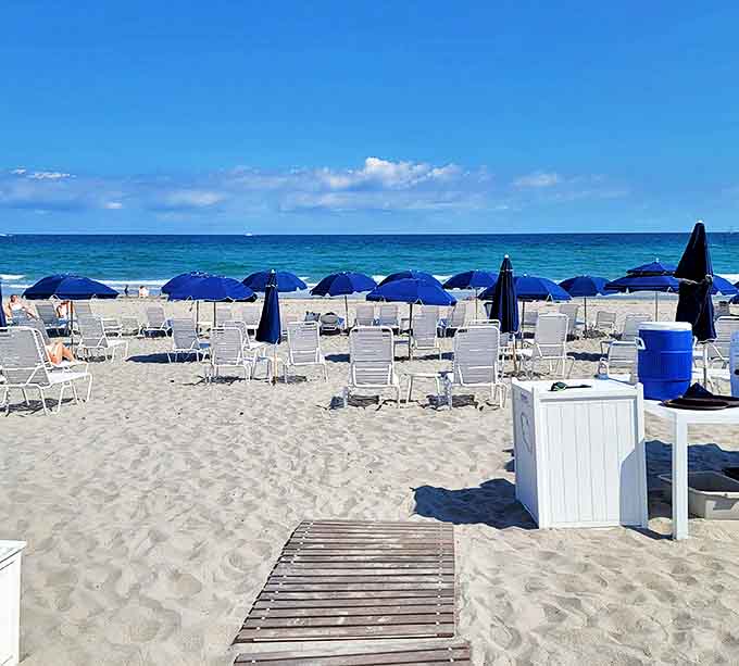 Paradise defined &ndash; where blue umbrellas dot white sands and the hardest decision is whether to swim or sunbathe.