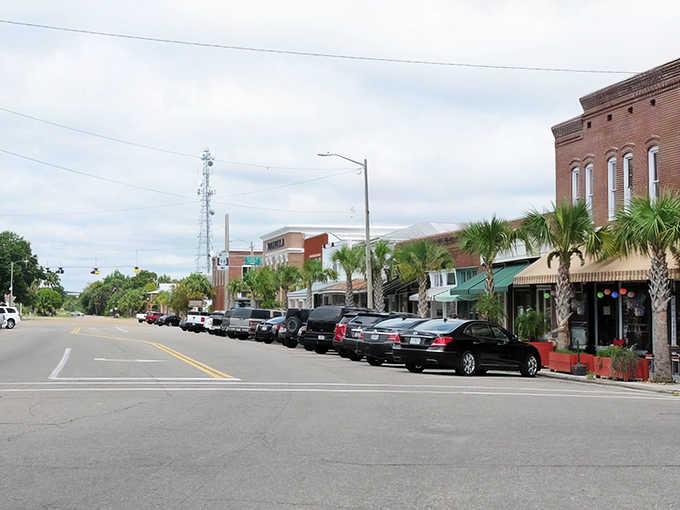 Palm trees and historic storefronts create that perfect Florida Panhandle combination of tropical and traditional that never gets old.