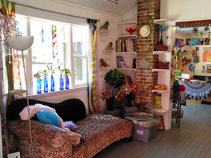 Even the lounging areas refuse to be ordinary, with zebra prints and blue bottles creating conversation spaces as unique as the conversations themselves.
