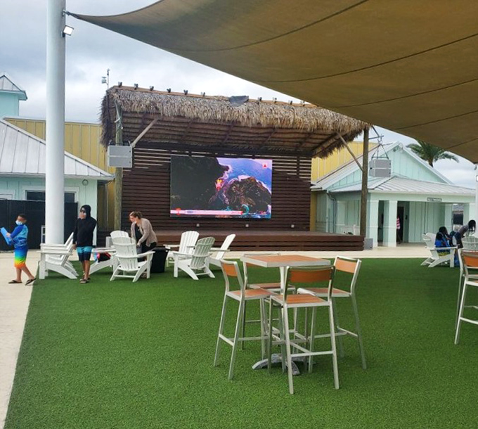 Event Lawn & Outdoor Screen Area Where movies under the stars transform ordinary evenings into core memory material.