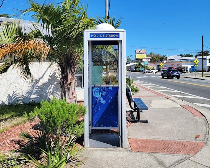 From the roadside, this blue and white sentinel looks almost like a normal phone booth&mdash;until you read the sign!