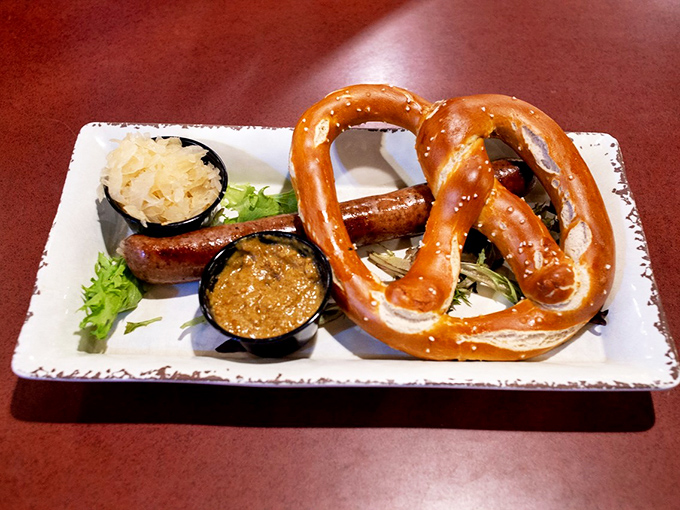 This isn't just food; it's edible German heritage featuring a pretzel that's twisted to perfection and sausage that means business.