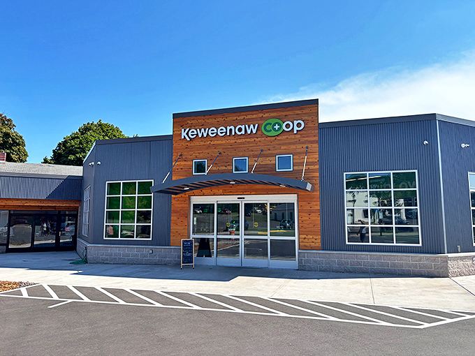 The Keweenaw Co+op's modern design combines wood and metal elements, offering fresh, local provisions to health-conscious shoppers.