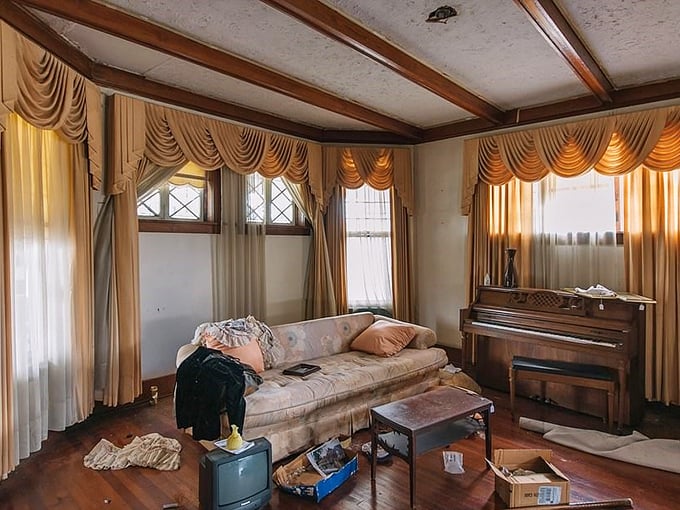 Elegant drapery and a forgotten piano create an accidental still life, frozen in time like a photograph from another century.