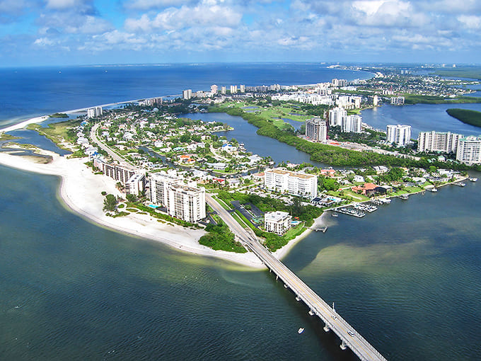 From above, the true majesty of Florida's coastal geography reveals itself in a patchwork of blue, green, and sandy beige.