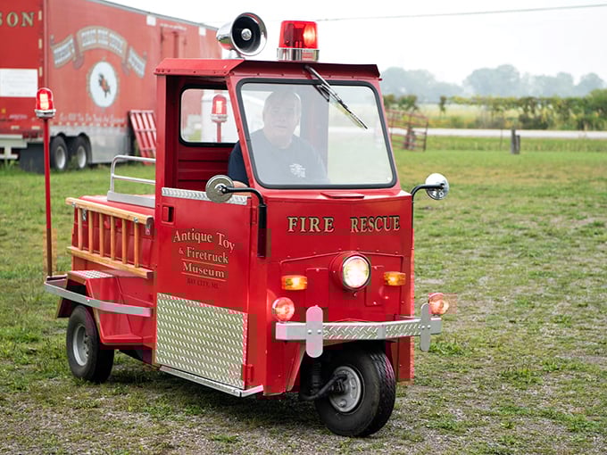 This custom miniature fire truck offers rides that create memories lasting far longer than the brief journey around the museum grounds.